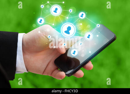 Finger pointing on smartphone, social network concept Stock Photo - Alamy
