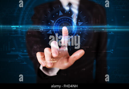 Handsome tech guy pressing high technology control panel screen concept ...