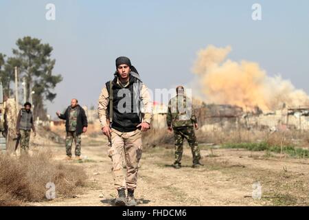 Daraya, Damascus. 24th February, 2016. Syrian soldiers walk past ...