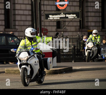 Police motorbike outriders escorting Government Minister to Parliament ...
