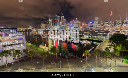 An evening view of the city of Sydney and Darling Harbour with lights ...