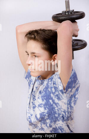 boy lifting weights Stock Photo - Alamy