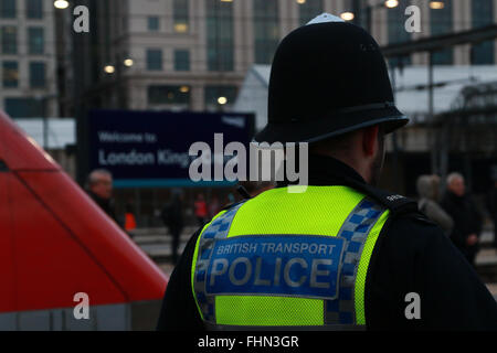 british transport police officer at kings cross rail station london ...