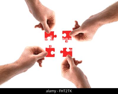 Jigsaw pieces being put together. Business solution concept Stock Photo ...