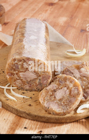 Head cheese cold cut vintage wooden background. Brawn with onion ...