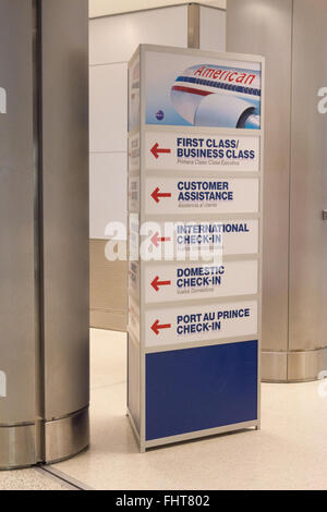 Concourse signs at Miami airport Stock Photo - Alamy