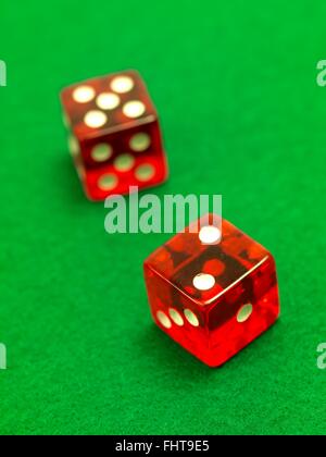 Pair of red plastic dice isolated on white Stock Photo - Alamy