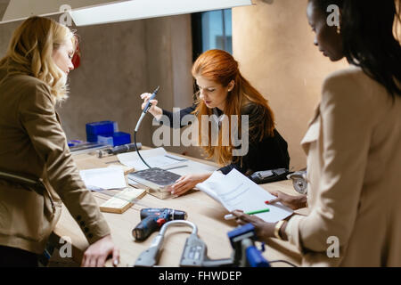 Creative women working on project Stock Photo - Alamy