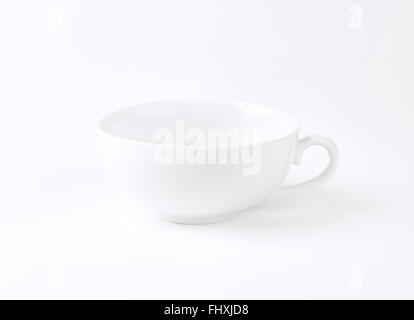 empty tea cup on white background Stock Photo - Alamy