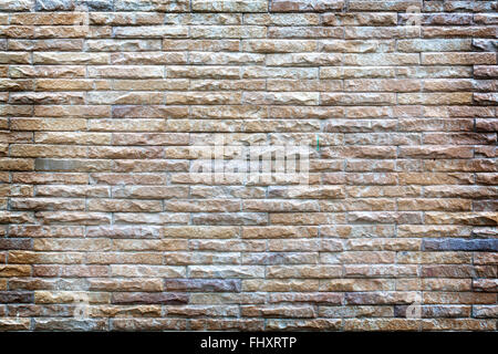 Elegant stone wall from small square parts Stock Photo - Alamy