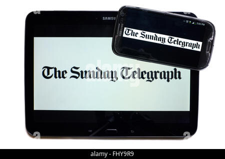 The logo of The Telegraph newspaper displayed on the screens of a ...