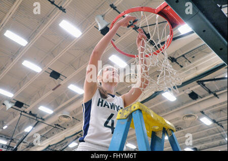Basketball Player tradition of cutting down the net following the ...