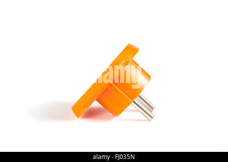 Orange travel plug multi adapter Stock Photo - Alamy