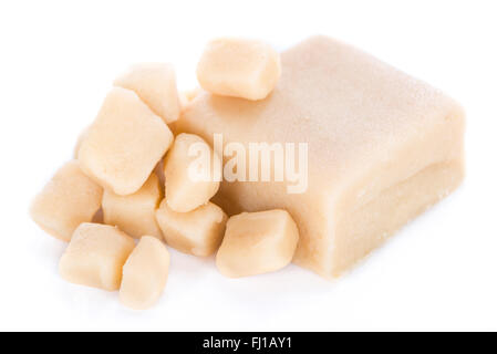 piece of marzipan and almonds isolated on white background, selective ...