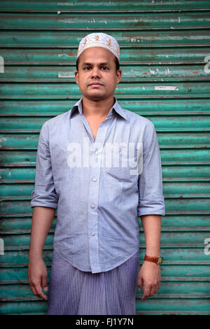 Portrait of Muslim man with Taqiyah (cap) and beard and prayer bump ...