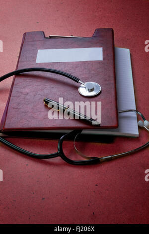 Biro pen notepad on wooden board horizontal image office concept Stock ...