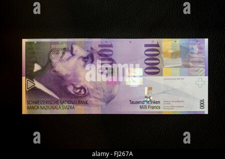 1000 Swiss francs banknote on black background Stock Photo - Alamy