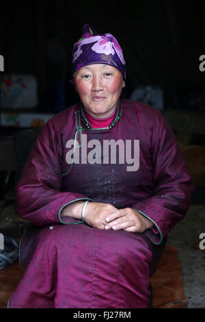 Woman with reindeer, , Tsaatan Dukha people , nomadic reindeer herders ...