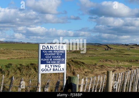 Beware of flying golf balls Stock Photo - Alamy