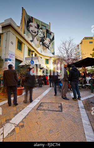 Graffiti and coffee shop in Psirri neighborhood in Heroes' square ...