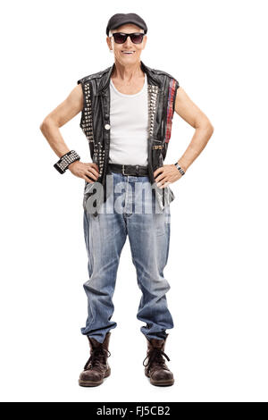 Full length portrait of a senior punk rocker pretending to play guitar ...