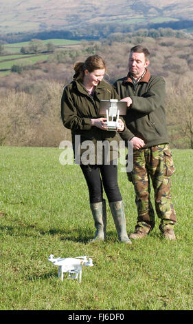 teaching a student how to fly a drone Stock Photo - Alamy