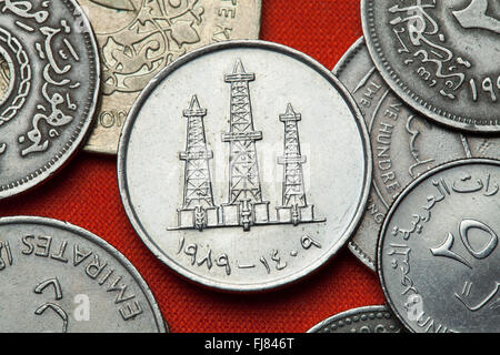 Coins of the United Arab Emirates. Oil derricks depicted in the UAE 50 ...