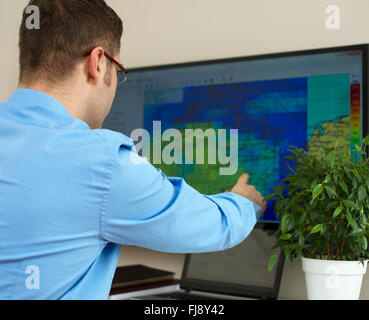 Meteorologist at work Stock Photo - Alamy