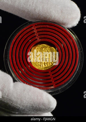 A gold coin, a so called Charon's obol, from the 6th century is ...