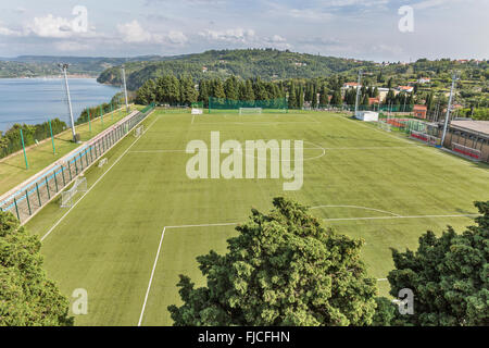 Outdoor football staduim in small town Piran, Slovenia Stock Photo - Alamy
