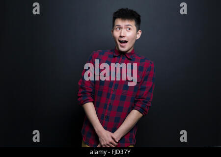 Young Chinese man eavesdropping Stock Photo - Alamy