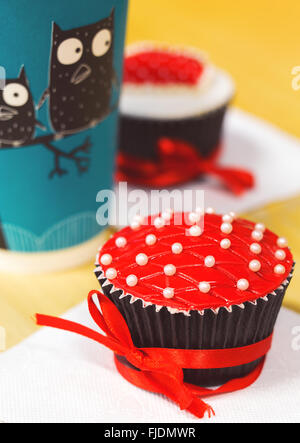 Valentine's Day cupcake decorated with red sugar-coated chocolates ...