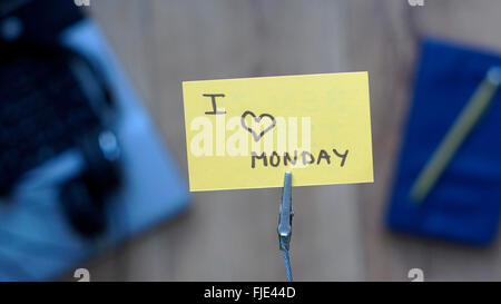 I love monday written on a memo atr the office Stock Photo - Alamy