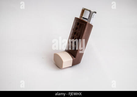 Preventer brown inhaler showing canister of liquid end cap and main ...