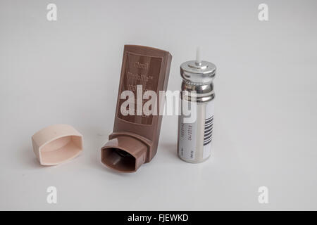 Preventer brown inhaler showing canister of liquid end cap and main ...