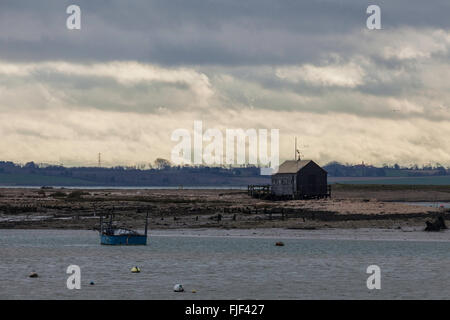 Isolated Boathouse off Mersea Island Stock Photo - Alamy
