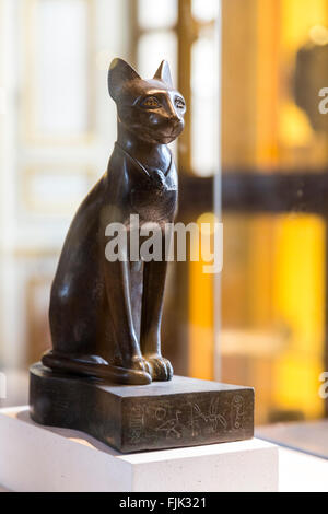 The statue of Bastet, an ancient Egyptian goddess, is depicted with a ...