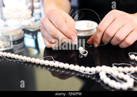 Workshop jewelery, creating jewelry with pearls. Pearls, beads ...