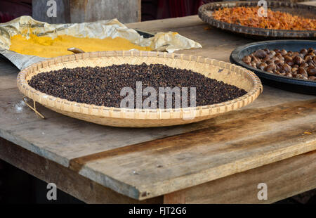 Black Pepper drying in the sun in Kerala, Southern India Stock Photo ...
