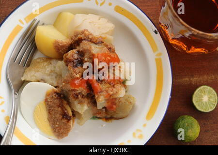 Steamed Mackerel Dumplings on Plate with Dipping Sauce Stock Photo - Alamy