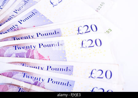 pictures of pounds banknotes on a white background Stock Photo - Alamy