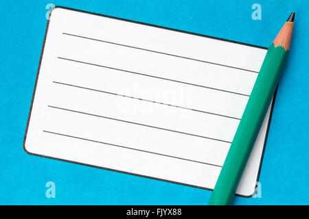 Exercise book name label and pencil Stock Photo - Alamy