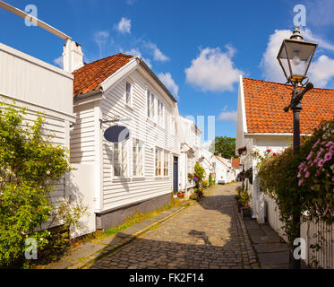 Traditional Norwegian red wooden houses (rorbuer) on the shore of ...