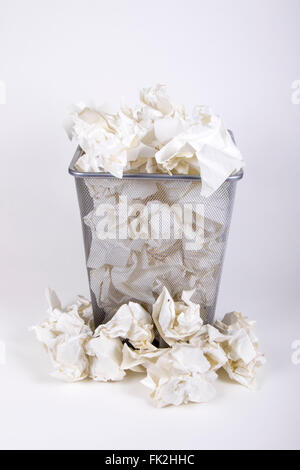 Waste Bin With Screwed Up Paper Stock Photo - Alamy