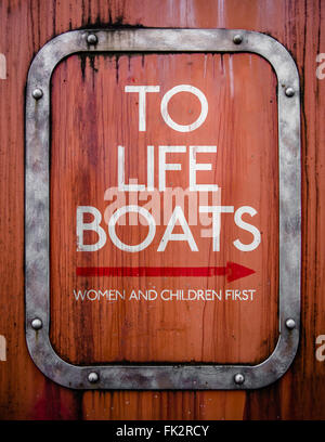 Cruise ship life boat sign Stock Photo - Alamy