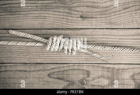 Junction between two mountain ropes on wooden background Stock Photo ...