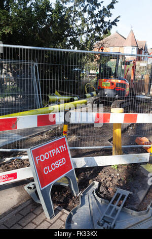 London, England, UK. Footpath Closed, Pedestrians This Way signs in the ...