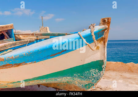 Old blue metal shabby fishing boat Stock Photo - Alamy