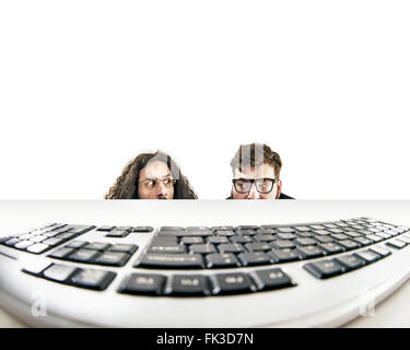 Young funny businessman with keyboard isolated on white Stock Photo - Alamy