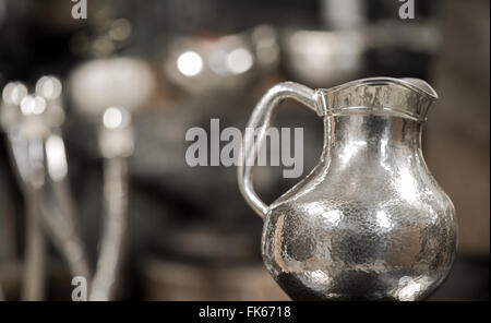 Pitcher silver in Master goldsmith workshop Stock Photo - Alamy